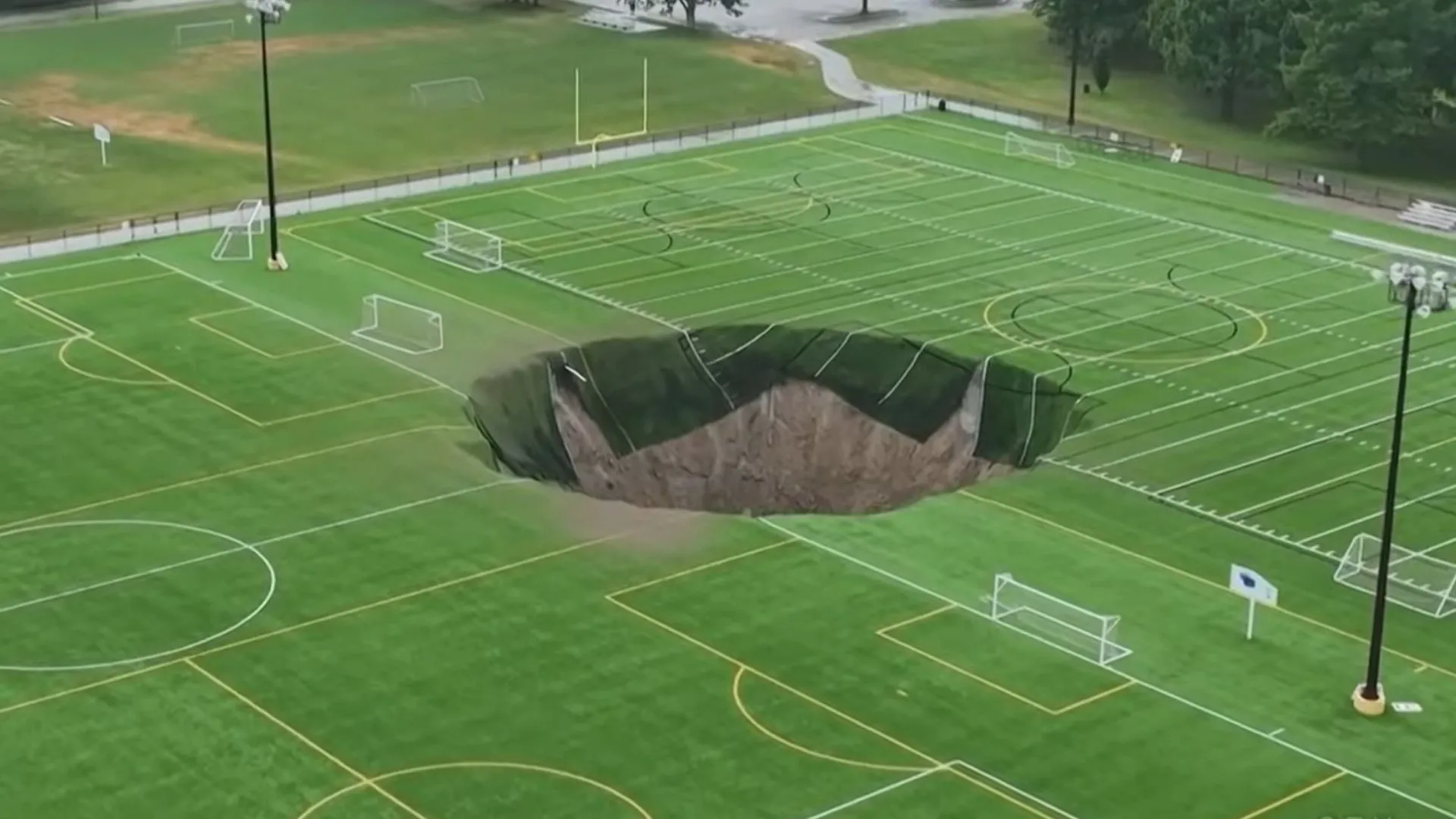 Huge sinkhole appears in Illinois soccer field after mine collapse